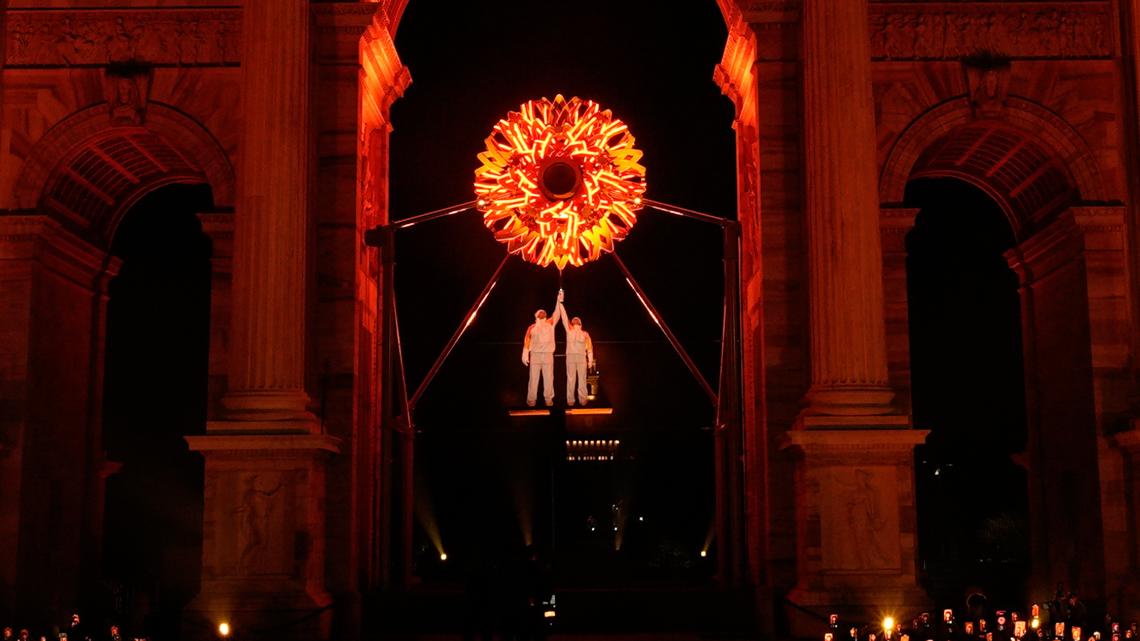 Who lit the Olympic cauldrons at the Opening Ceremony? | 12news.com