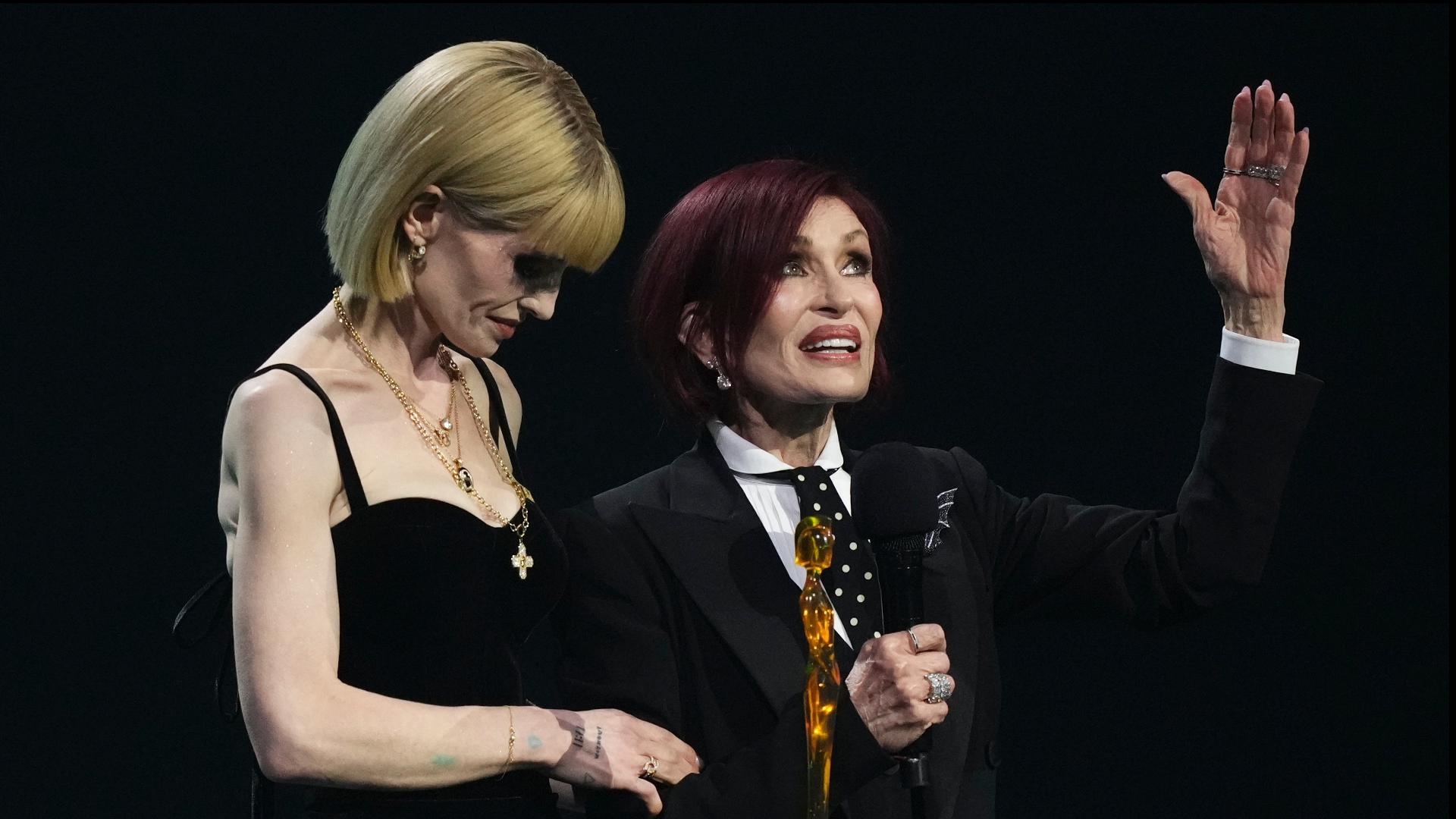 Sharon and Kelly Osbourne accept Ozzy's lifetime award at BRITs with ...