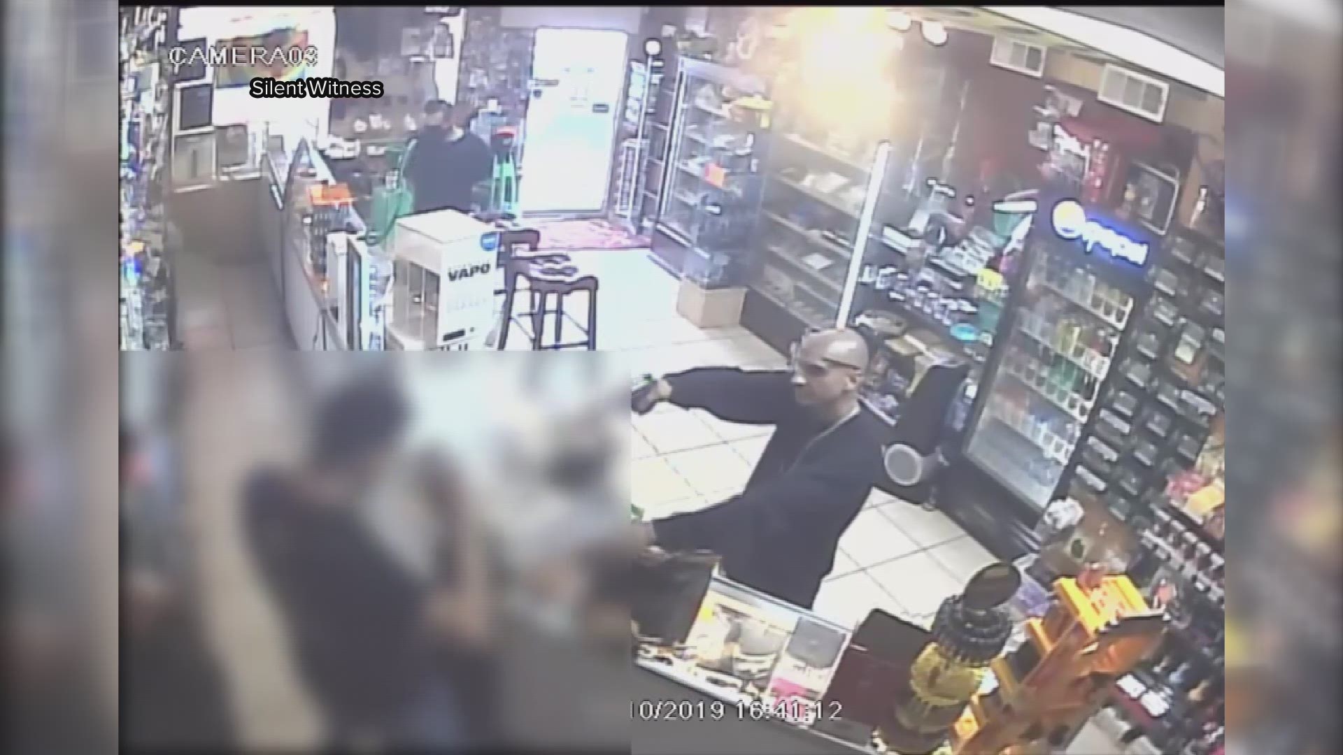 2 Men Caught On Camera Robbing Phoenix Smoke Shop At Gunpoint