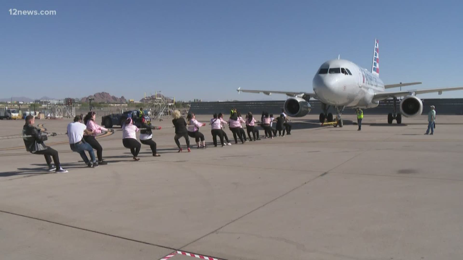 American Airlines hosts a 'jet pull' for charity | 12news.com