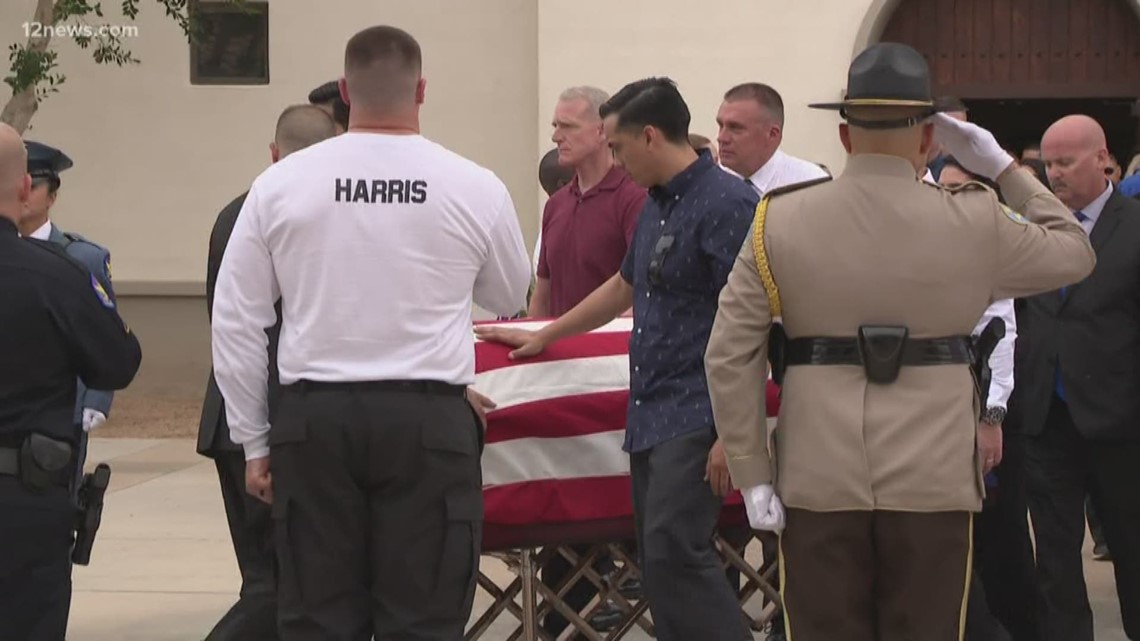 Hundreds line up to pay respects to fallen officer Paul Rutherford ...