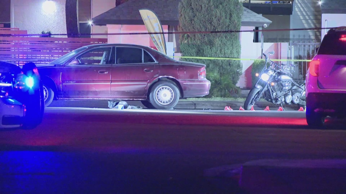Officer helps man pinned underneath car | 12news.com