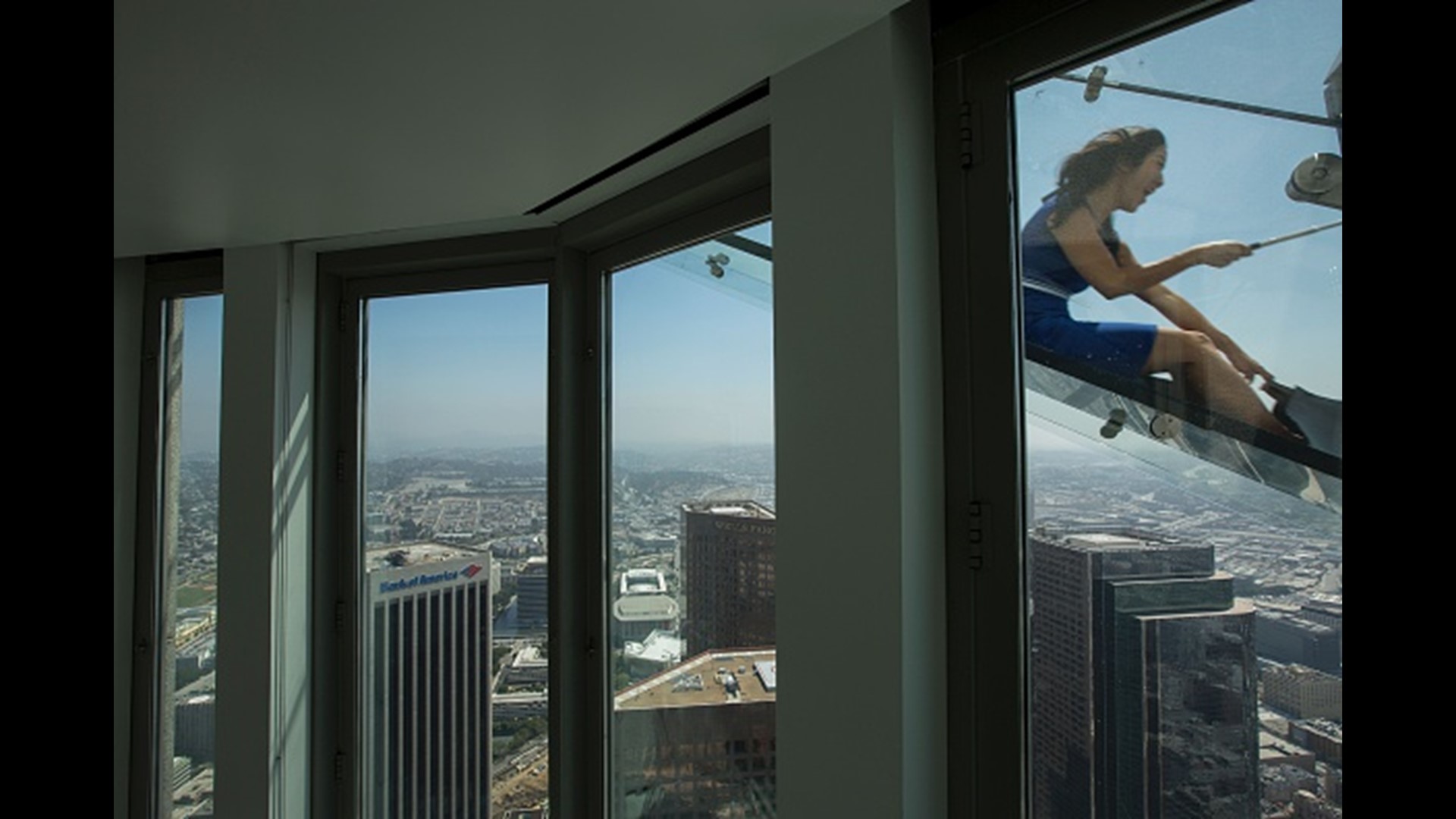 Taking a ride on a 1,000-foot-high glass skyslide | 12news.com