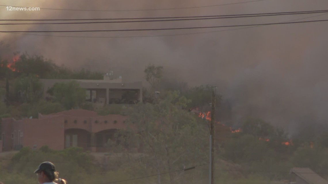 Evacuation orders lifted for residents living near Aquila Fire | 12news.com