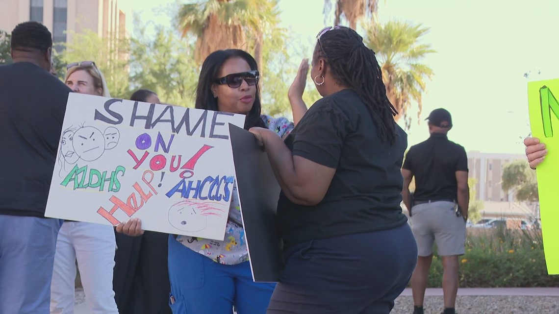 Suspended group home owners protest state decision | 12news.com