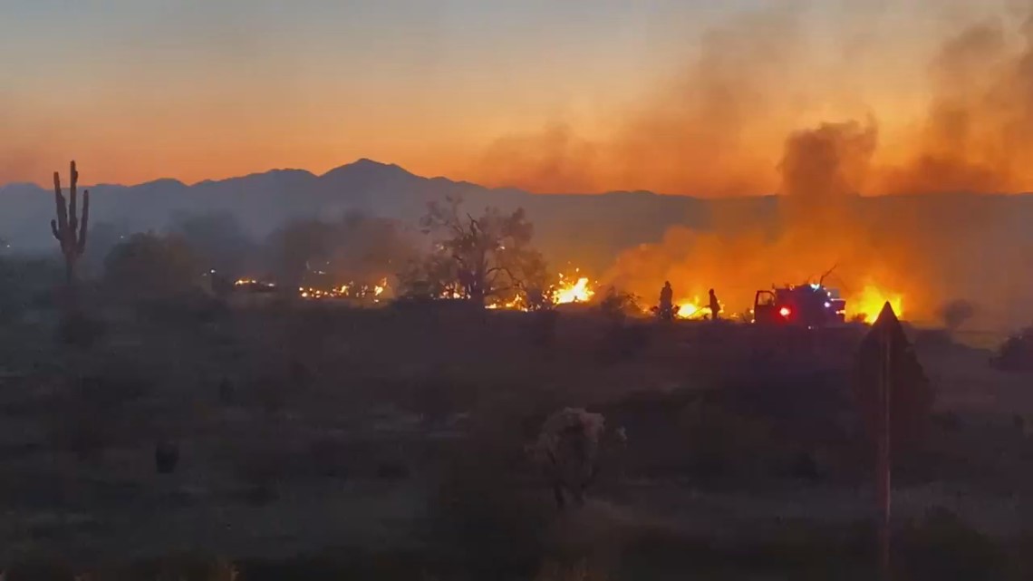 Crews working to keep north Phoenix brush fire from growing | 12news.com