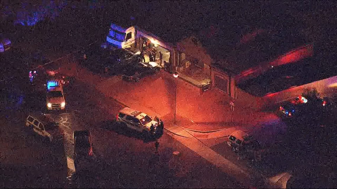 Woman who confronted officers with rifle dies after police return fire ...