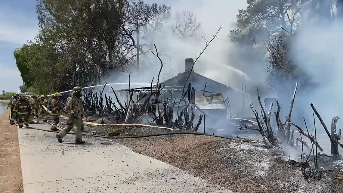 Firefighters battling double house fire in Phoenix | 12news.com