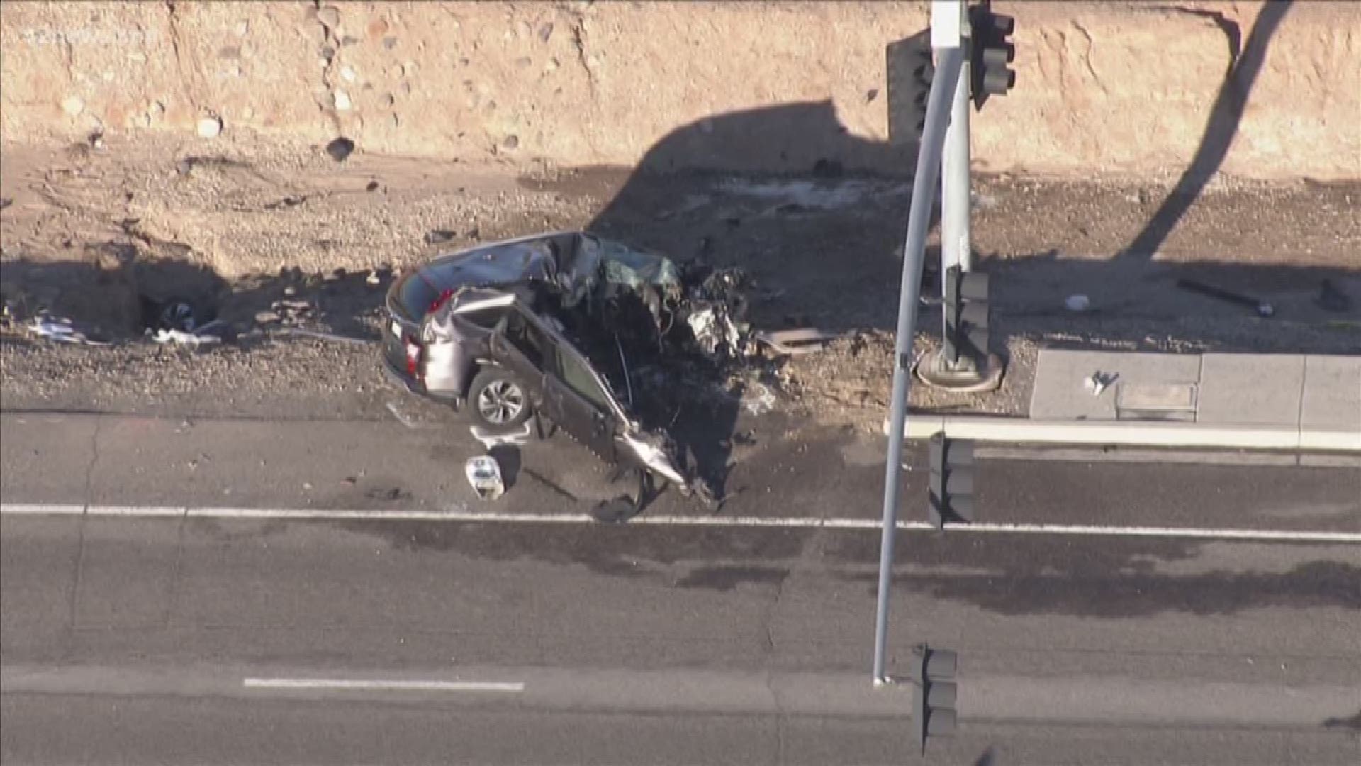 Car hits pole and catches fire in Surprise | 12news.com