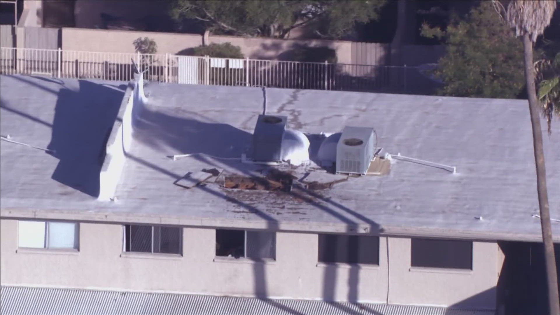 Phoenix firefighters save man from burning building | 12news.com