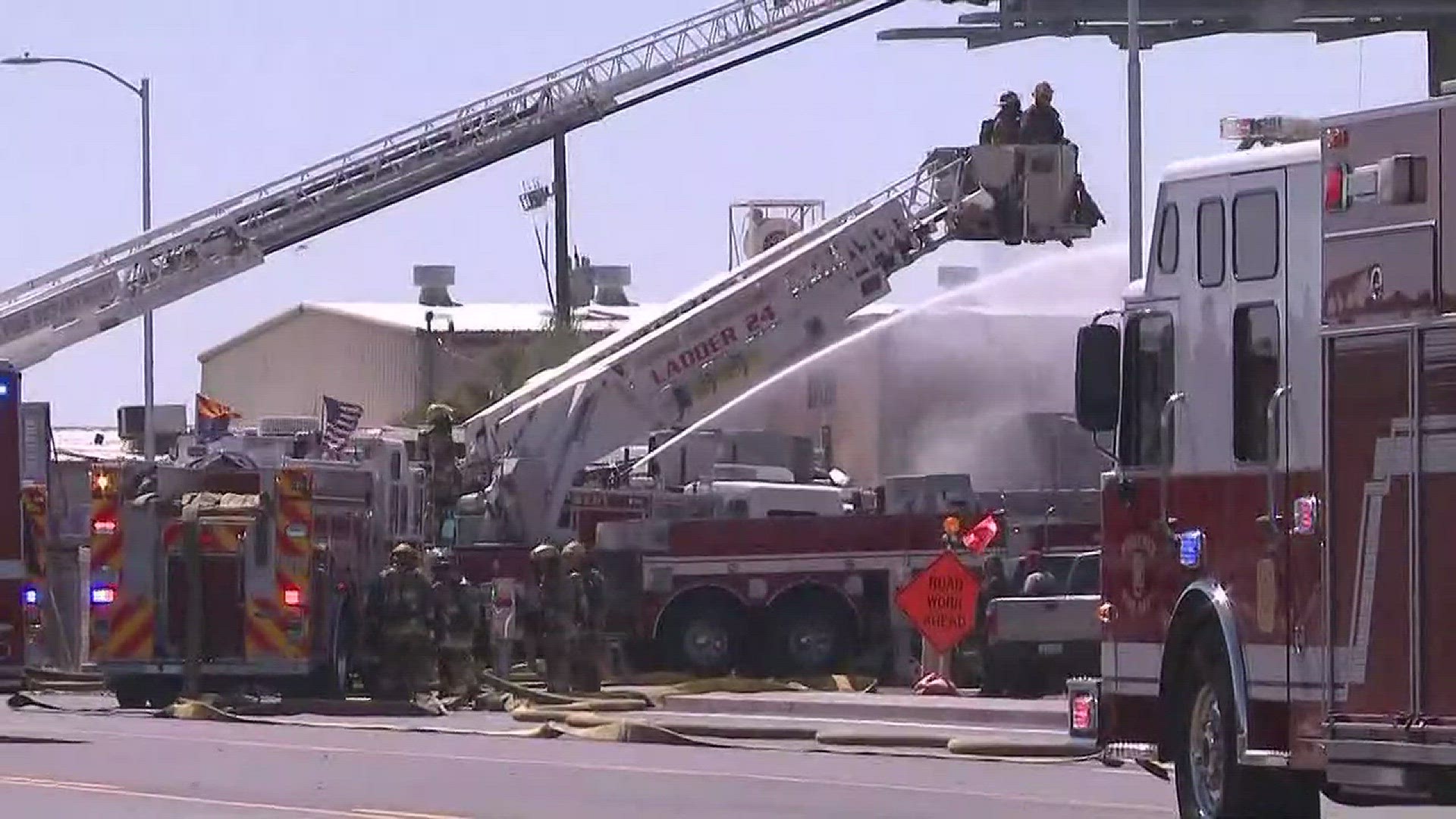 Crews fight first-alarm junkyard fire in southwest Phoenix | 12news.com
