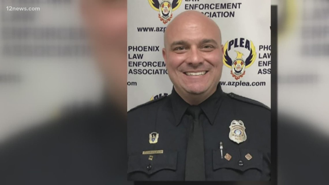 Former Phoenix officer will not get job back after punching man ...