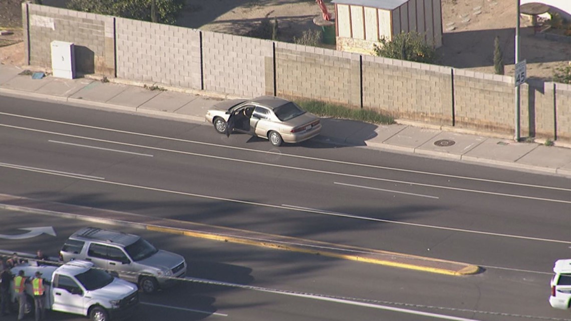 Woman ran car over man she was trying to help, police say | 12news.com