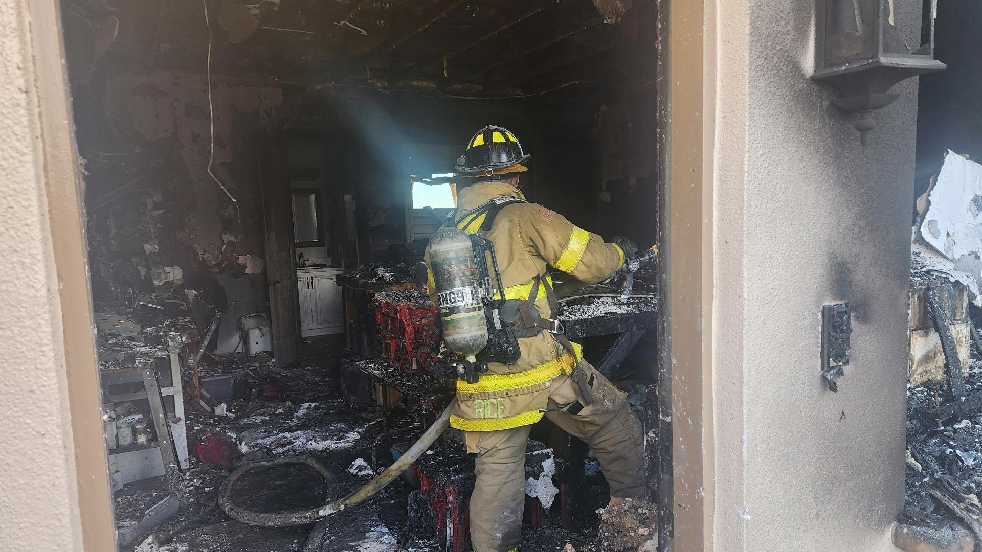 Resident collapses after exiting burning garage in north Scottsdale ...