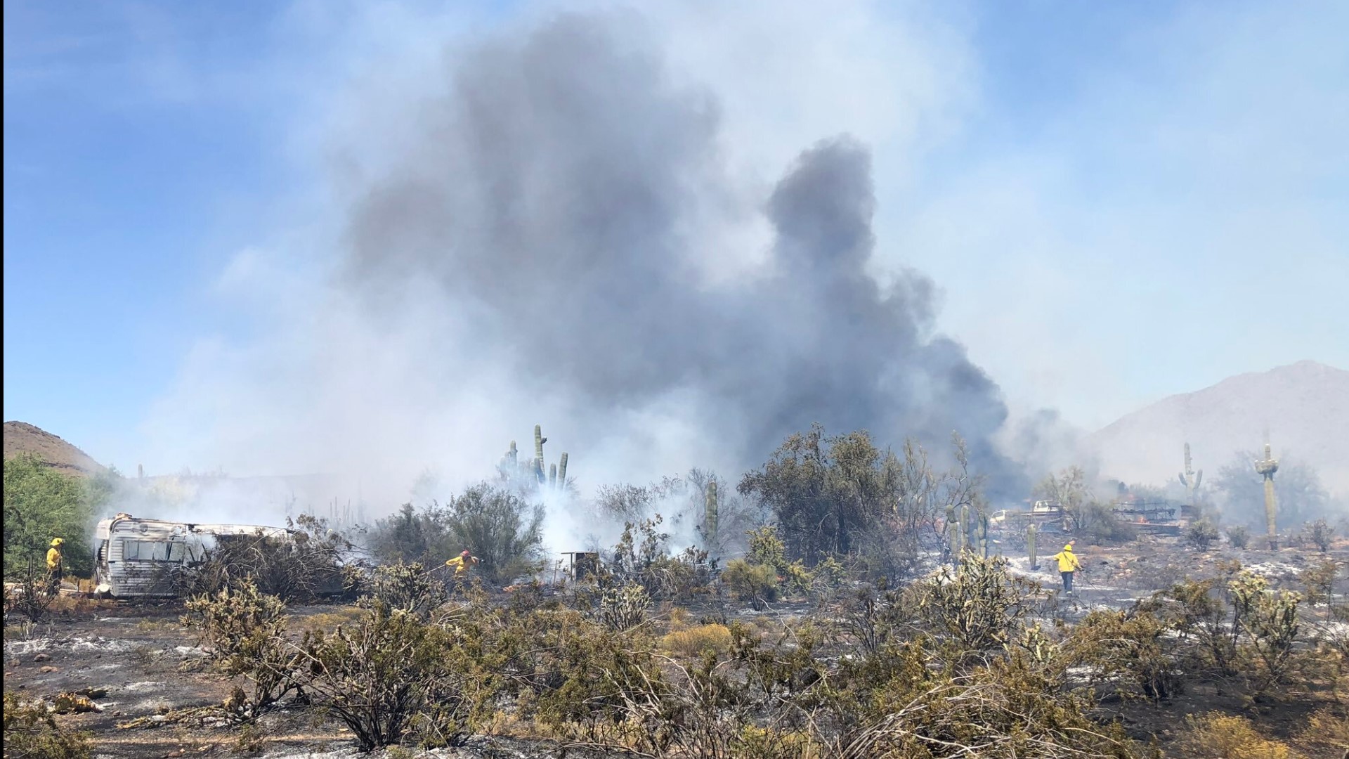 Officials: Human-caused north Phoenix brush fire is 80% contained ...