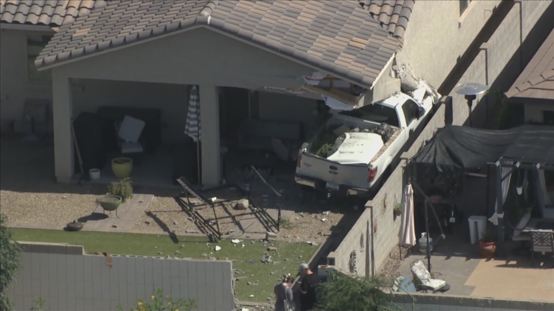 Truck crashes into home in south Phoenix | 12news.com