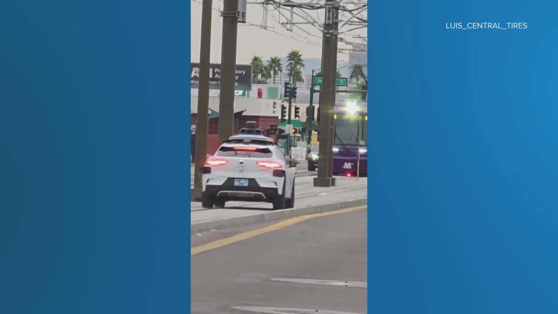 Waymo car seen driving on light rail tracks in Phoenix | 12news.com