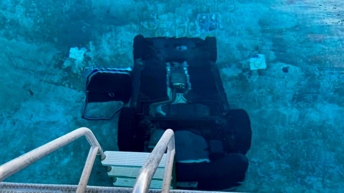 Car sinks to bottom of high school swimming pool in Arizona | 12news.com