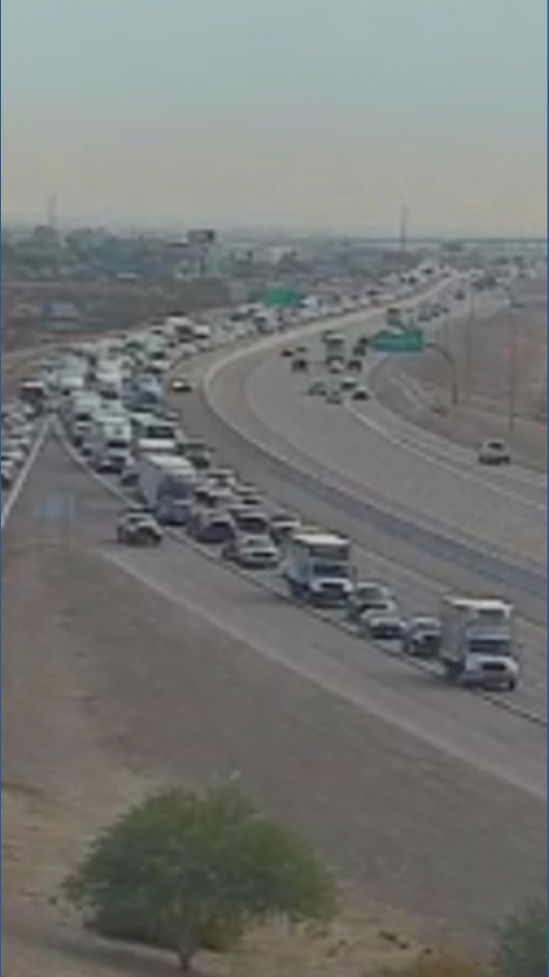 Semi truck rolls over barrier on I-10 near Buckeye | 12news.com