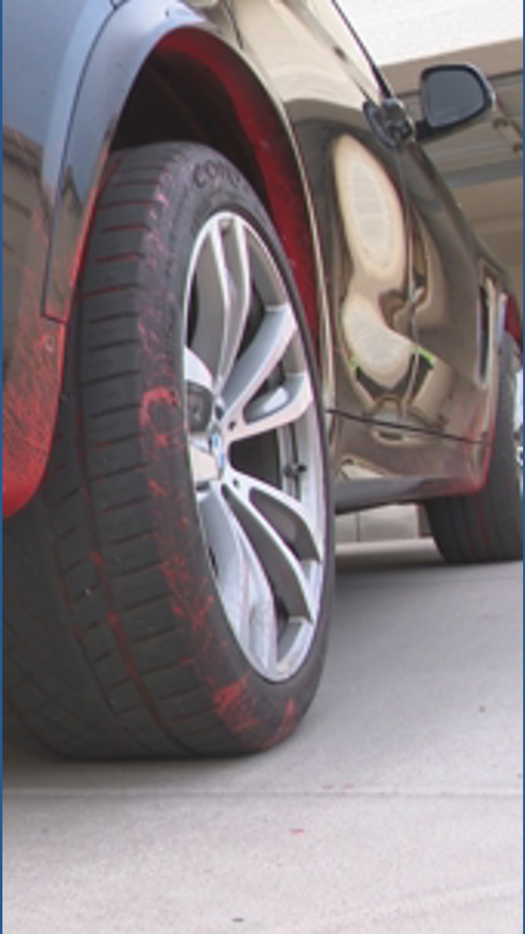 Wet, red paint spilled on roadway damages Arizona woman's car | 12news.com