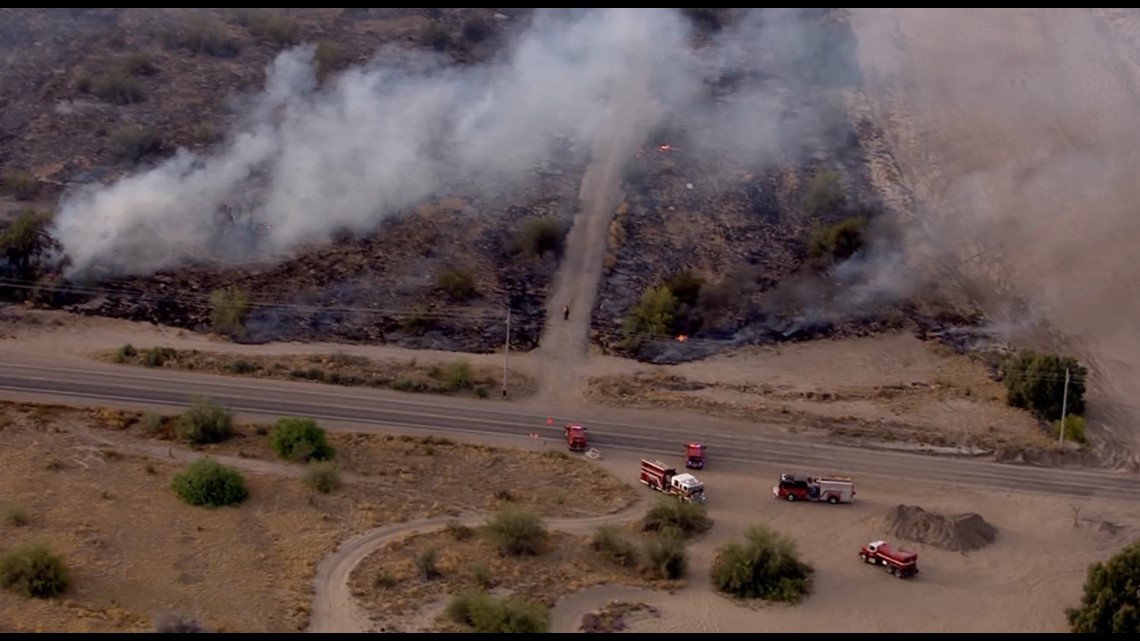 Brush fire burning west of Buckeye contained | 12news.com
