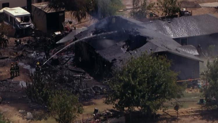 Propane tank 'explosions' reported during Phoenix house fire | 12news.com