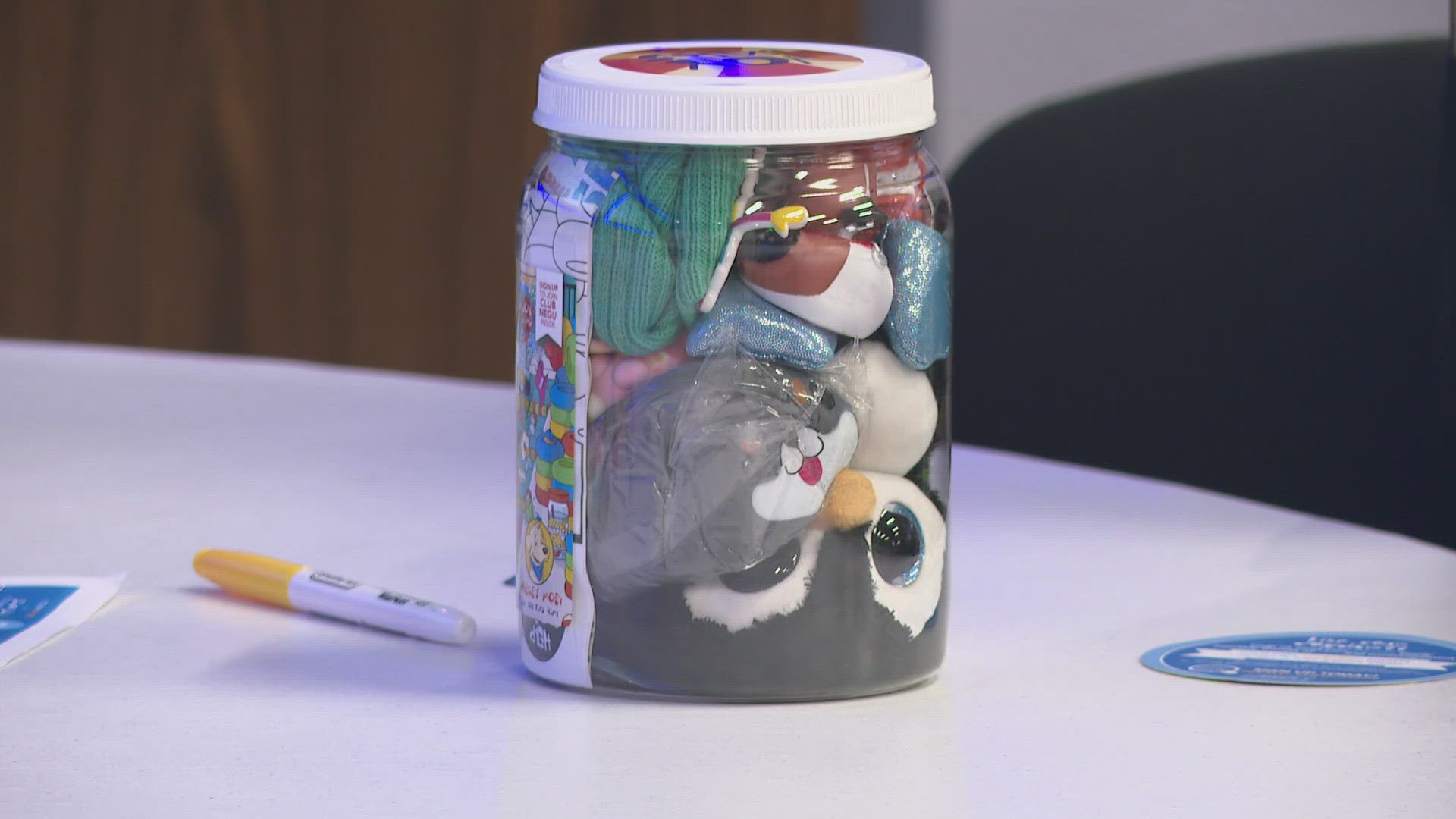 Packing 'Joy Jars' for children battling cancer in Arizona | 12news.com