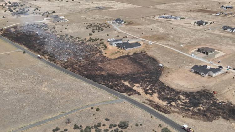 Neighbors jumped in to help stop wildland fire from spreading in ...