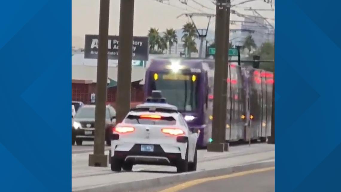Waymo car seen driving on light rail tracks in Phoenix | 12news.com