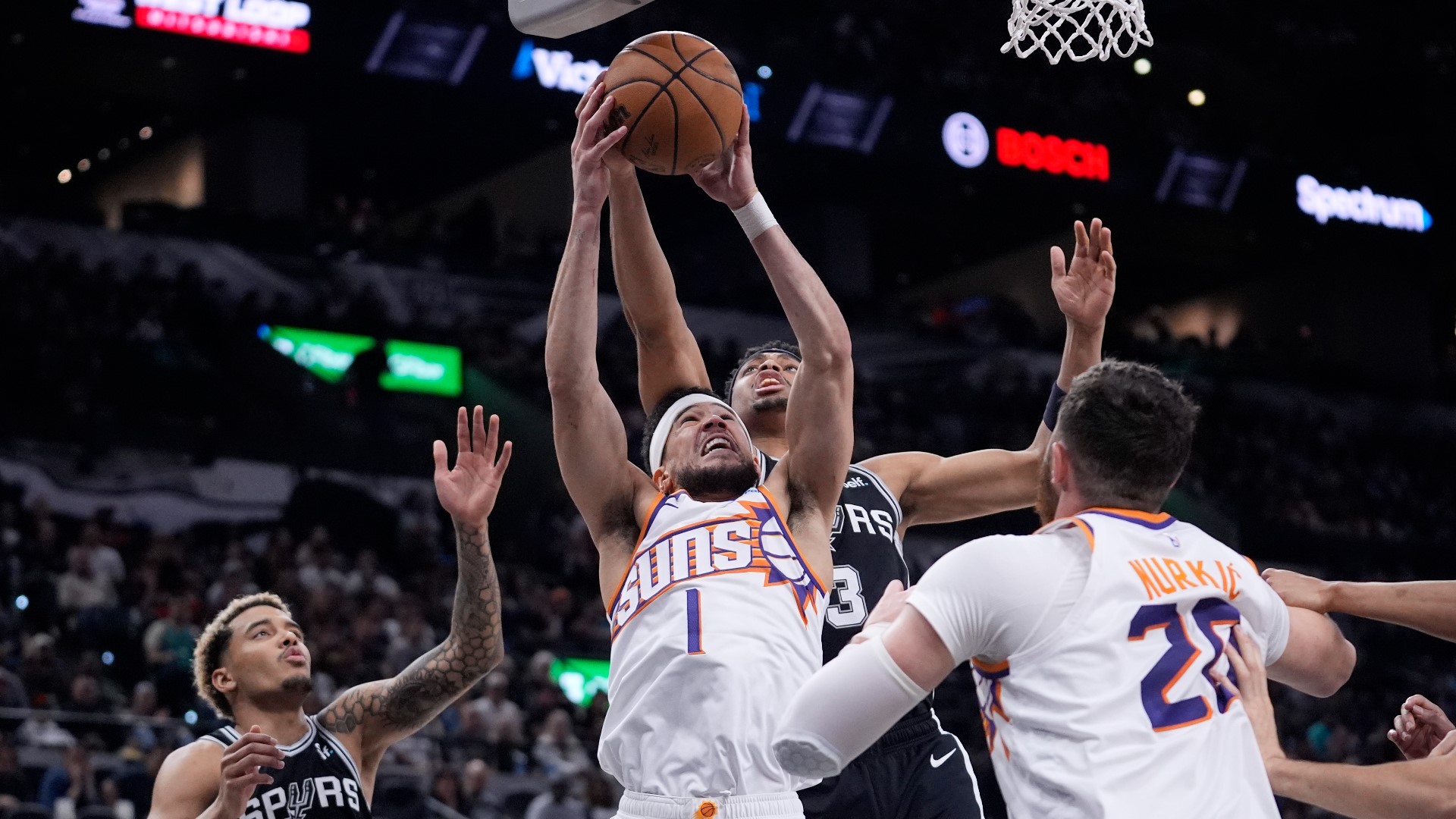 Booker scores 32 points and Suns never trail in steamrolling Spurs 131 ...