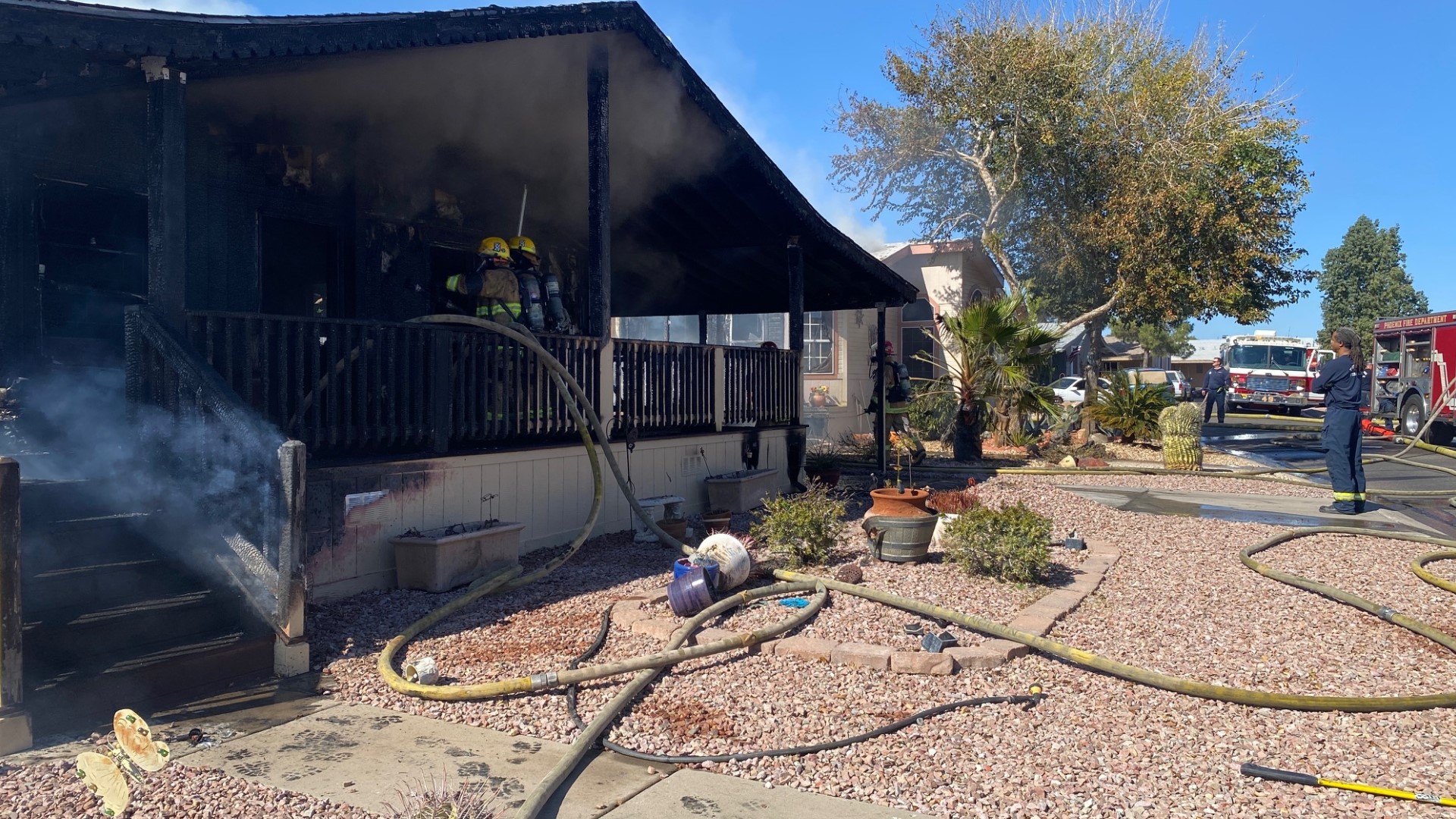 House fire in north Phoenix displaces residents, firefighter taken to ...