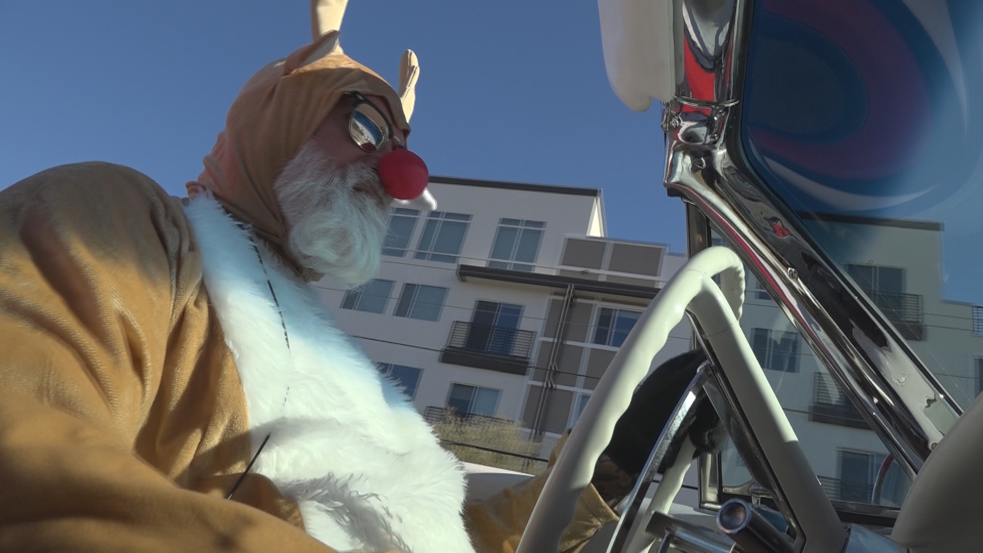 Santa and Rudolph driving in downtown Phoenix in a '61 Ford Thunderbird ...