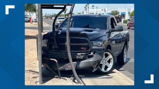 Man injured after truck crashes into Phoenix bus stop | 12news.com