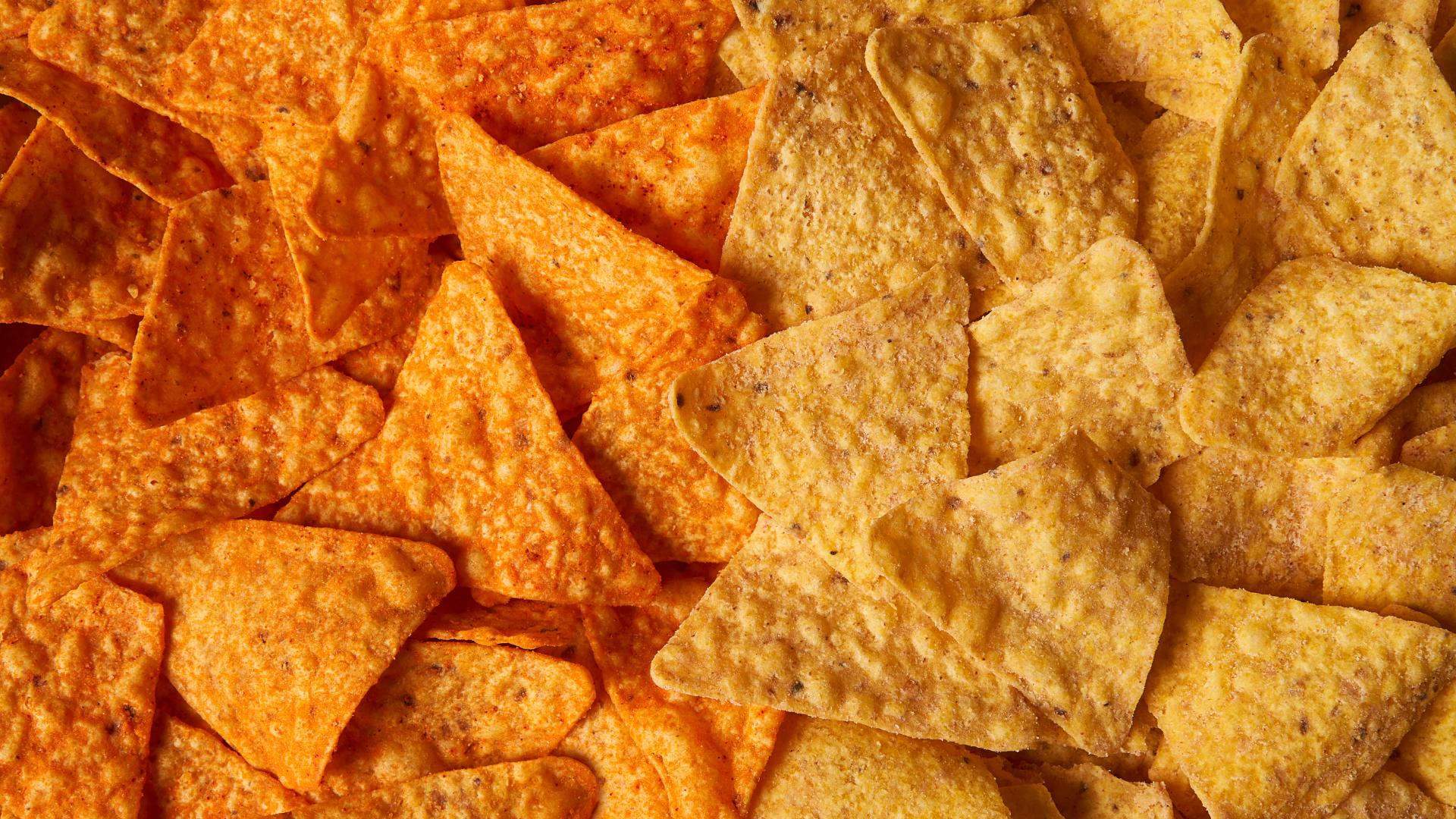 Doritos and Cheetos dial back the bright orange in new versions without ...