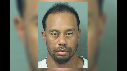 Tiger Woods' mug shot shows how much the picture has changed since 1997 ...