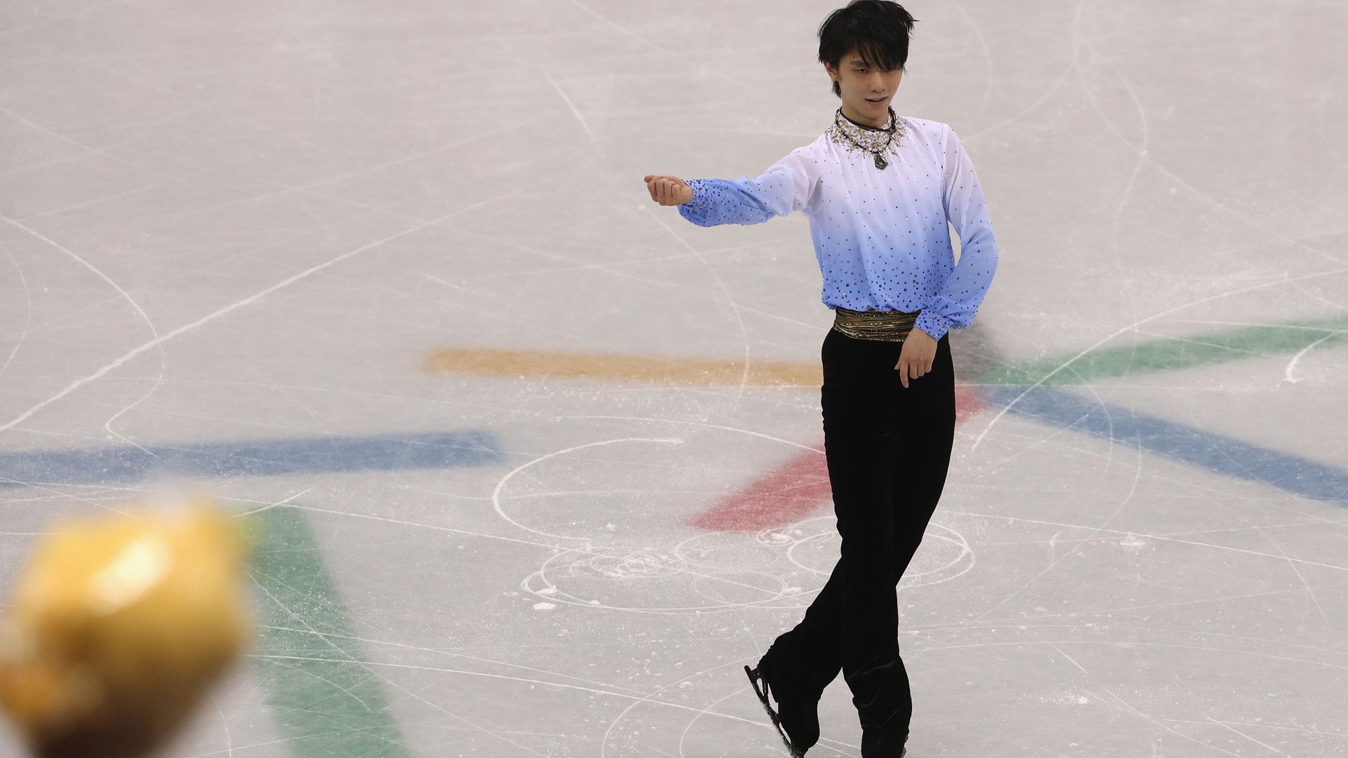 Why people throw Winnie the Pooh at skater Yuzuru Hanyu | 12news.com